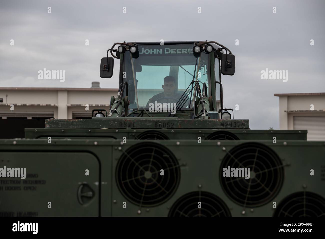 U.S. Marine Corps Lance Cpl. PhyoPyae Thura, an engineer equipment ...