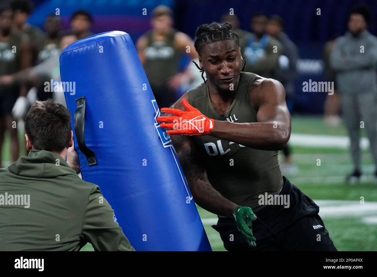 Florida A&M defensive lineman Isaiah Land runs a drill at the NFL ...