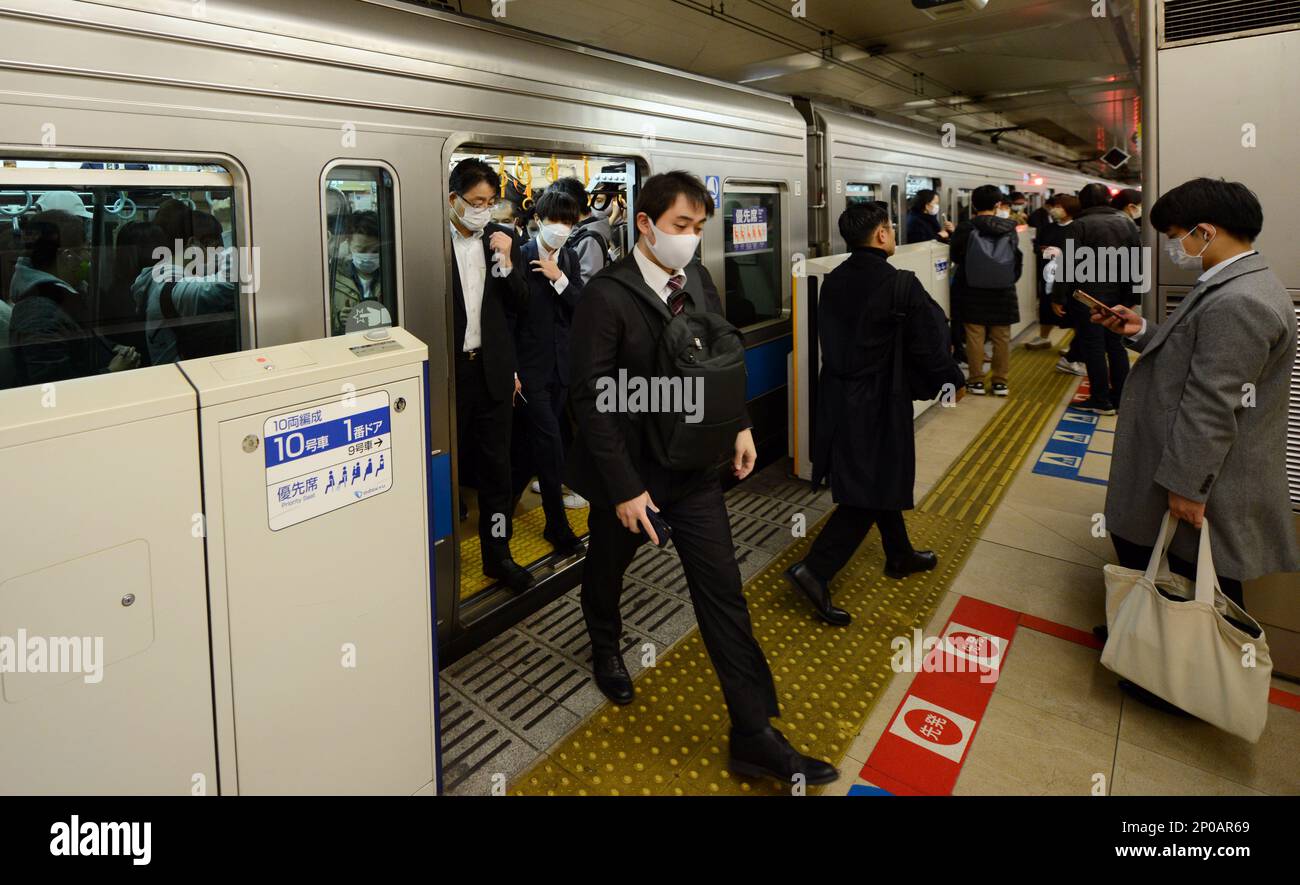 Passengers exiting t he Odakyu line in Shinjuku Odakyu station in Tokyo ...