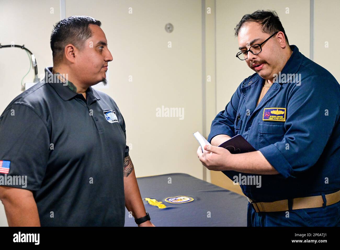 Lt. Raymond Lanphere, right, combat systems officer of the Independence ...