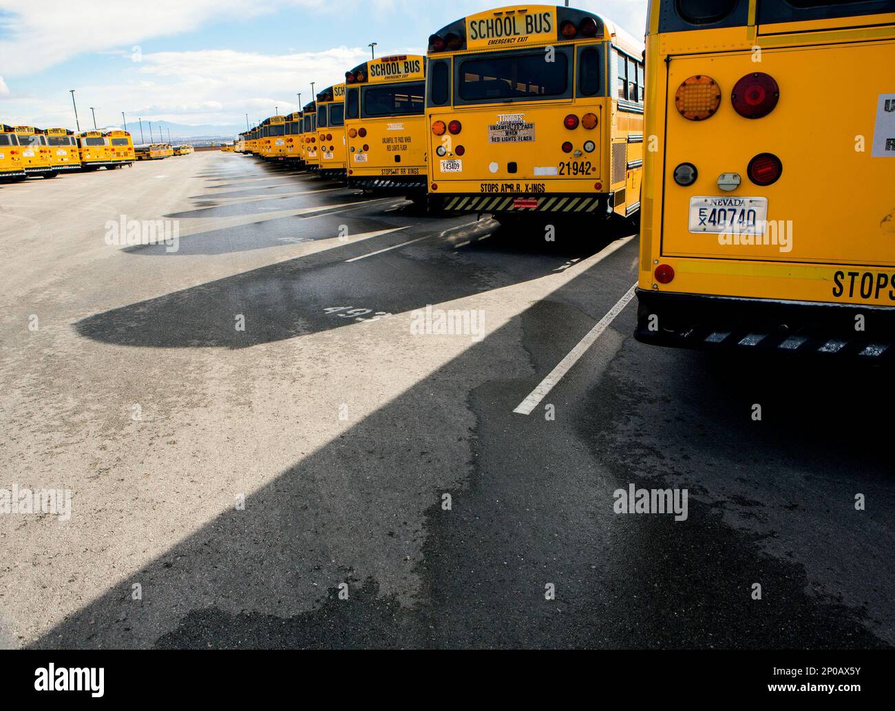Rows of buses line up at Clark County School District in the Northwest ...