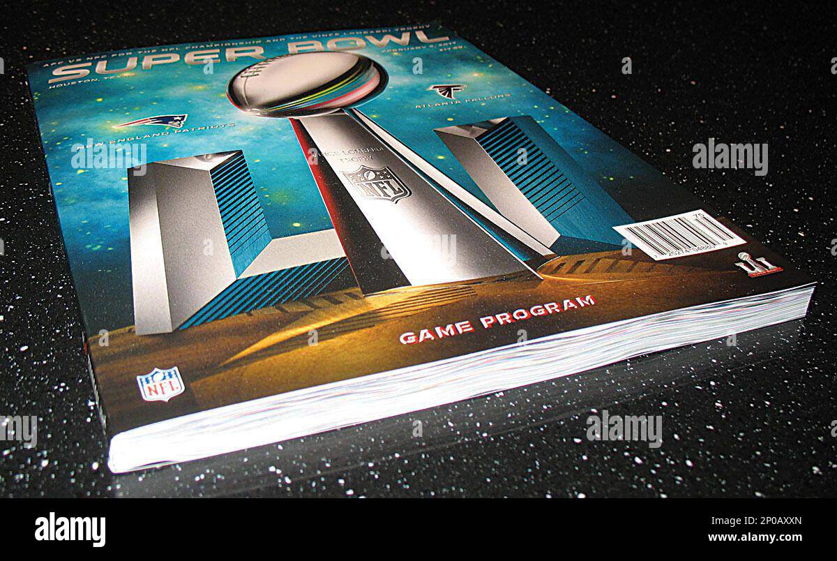 In this Tuesday, Jan. 24, 2017, photo, the Super Bowl LI program sits ...