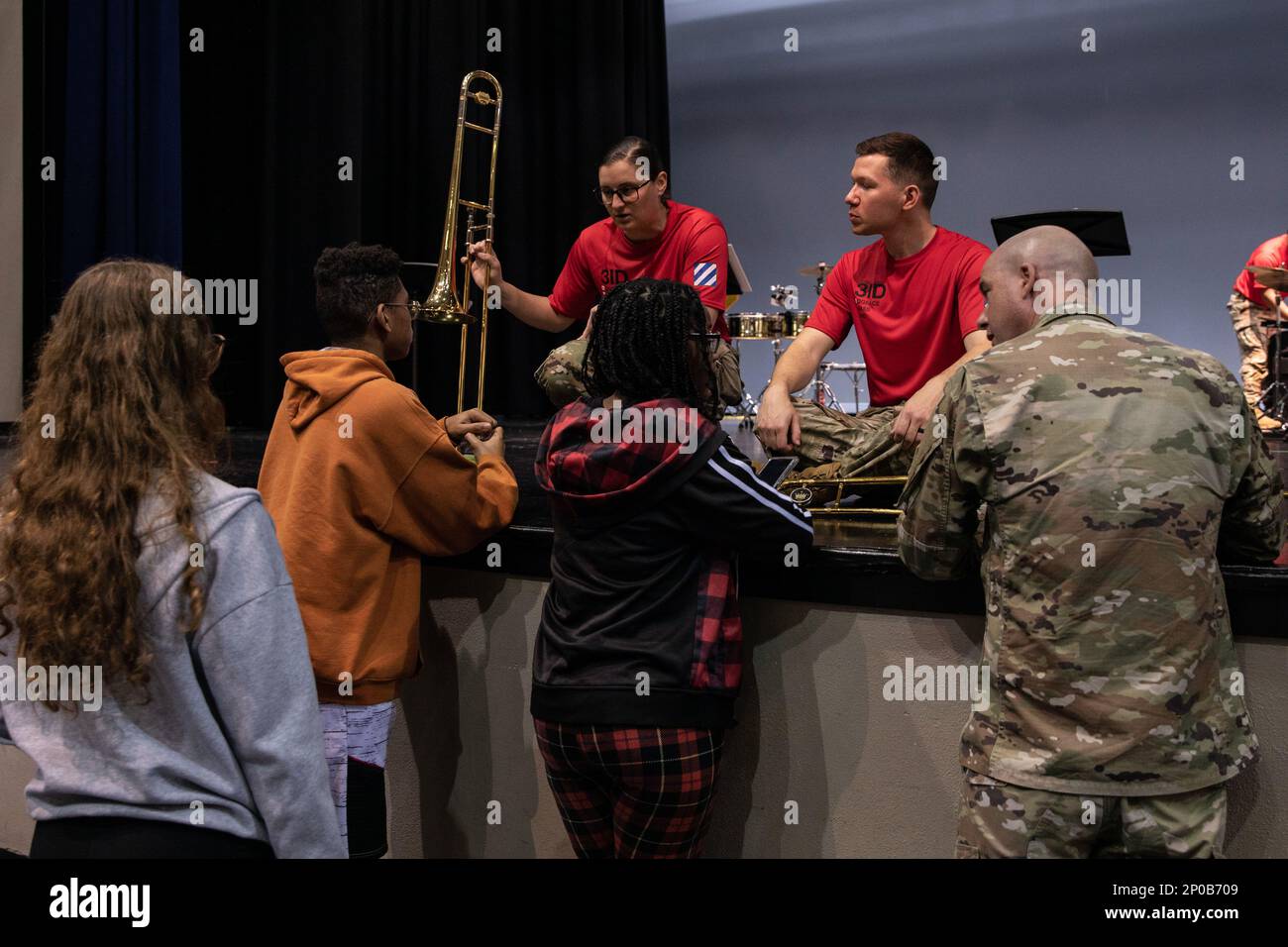 The 3rd Infantry Division Band talks to students at Lyman High School ...