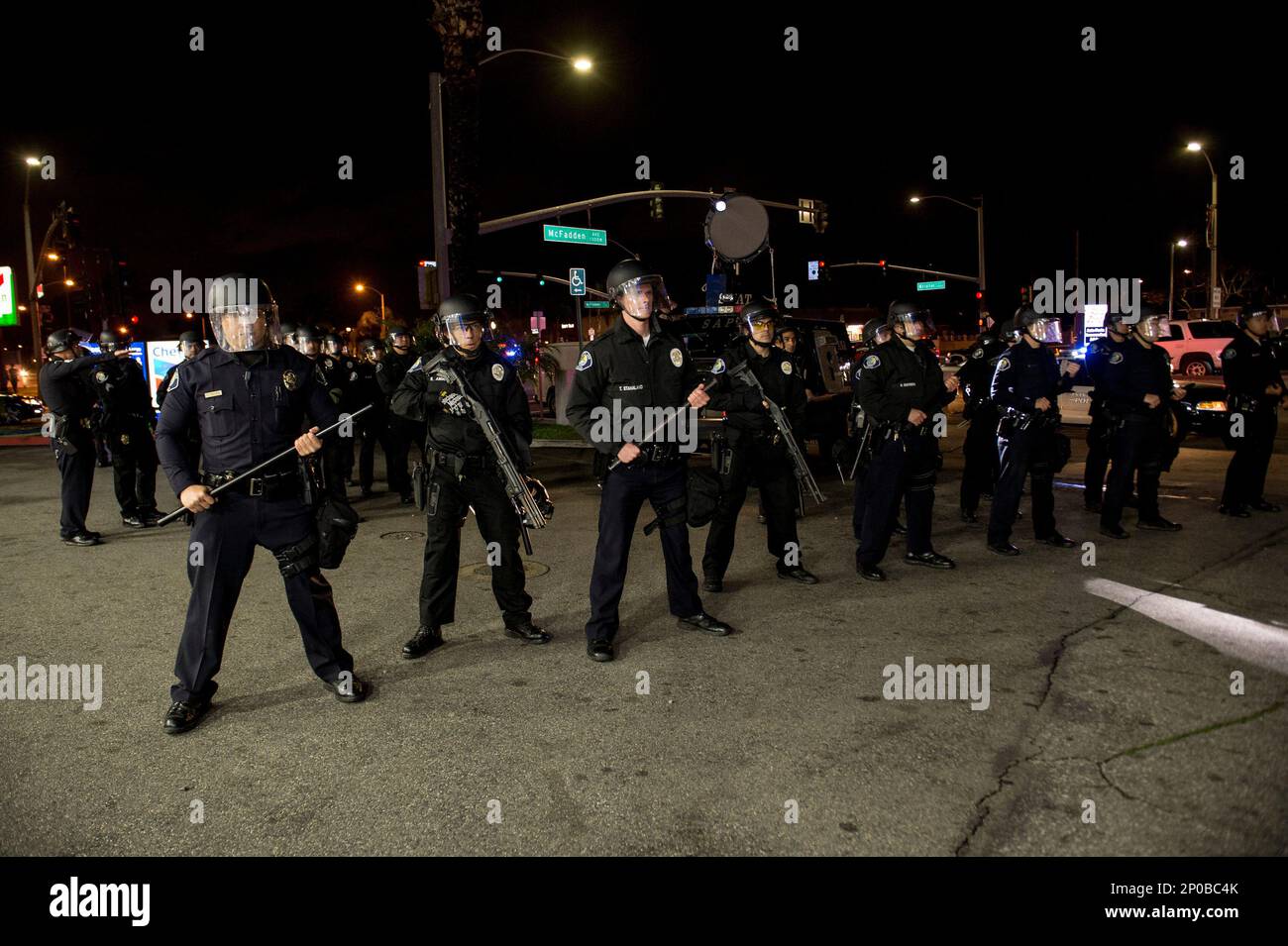 Santa Ana police officers stand ready as protesters against Donald ...