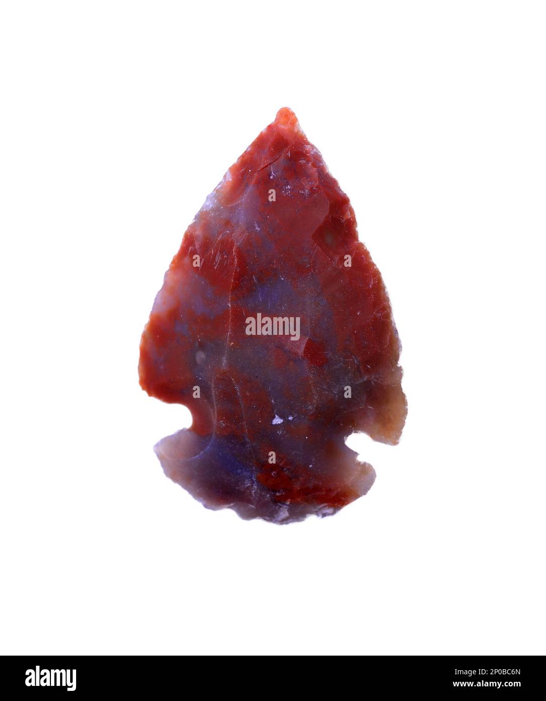 Ancient Prehistoric primitive stone arrowhead isolated over white Stock ...