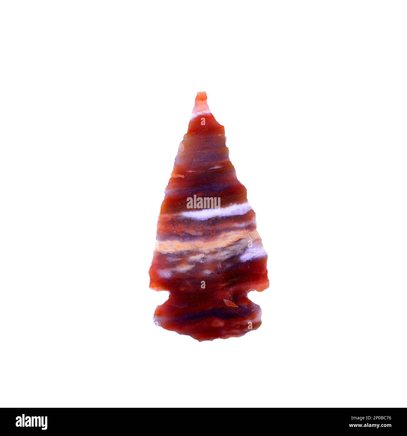 Ancient Prehistoric primitive stone arrowhead isolated over white Stock ...