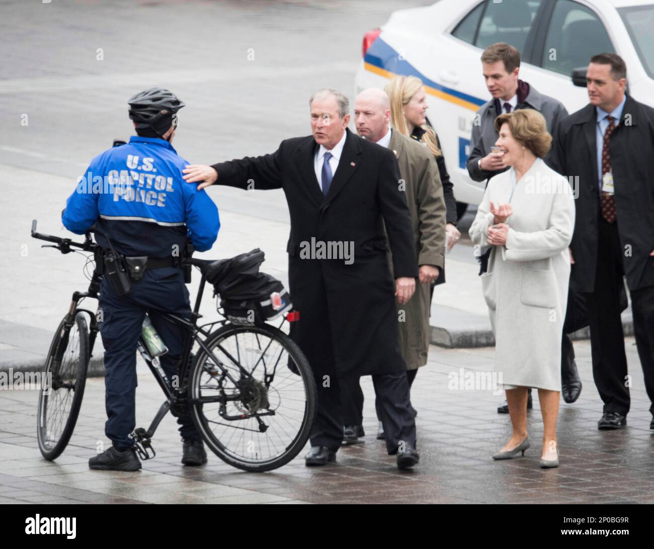 Former President George W. Bush and his wife Laura Bush arrive on ...