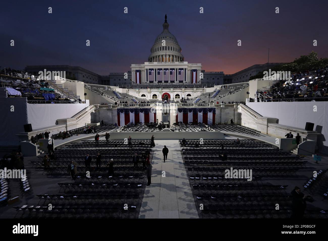 The sun begins to rise behind the Capitol in Washington, Friday, Jan ...