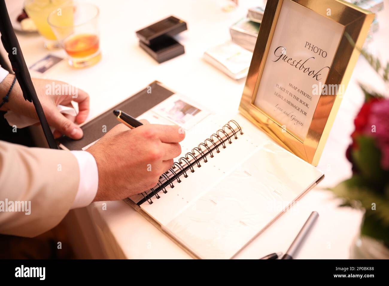 wedding invitation and welcome reception table Stock Photo - Alamy
