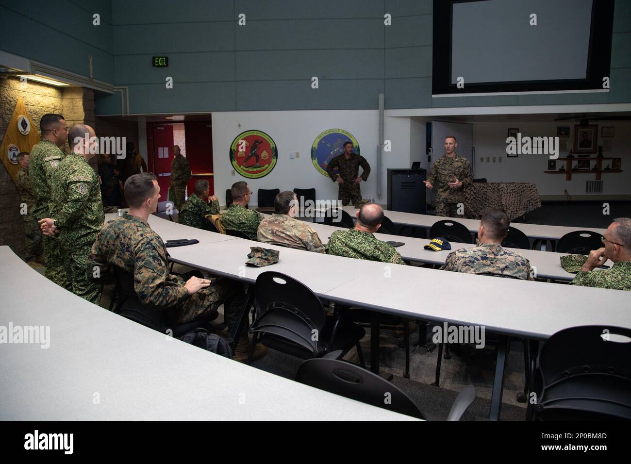 U.S. Marine Corps Capt. Jon Schumann, center, an infantry officer with ...
