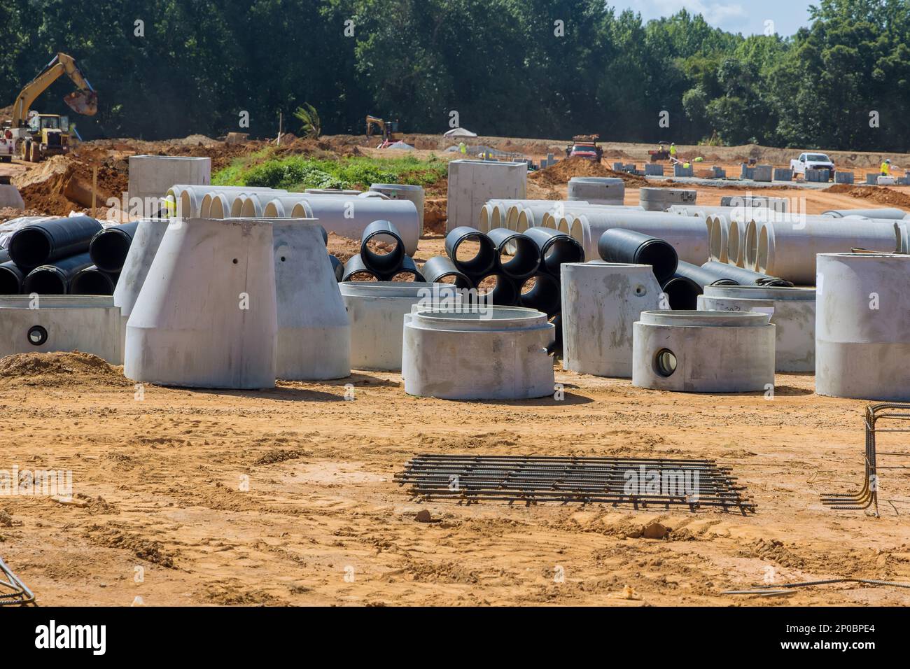 Reinforced concrete rings were being delivered to construction site for ...
