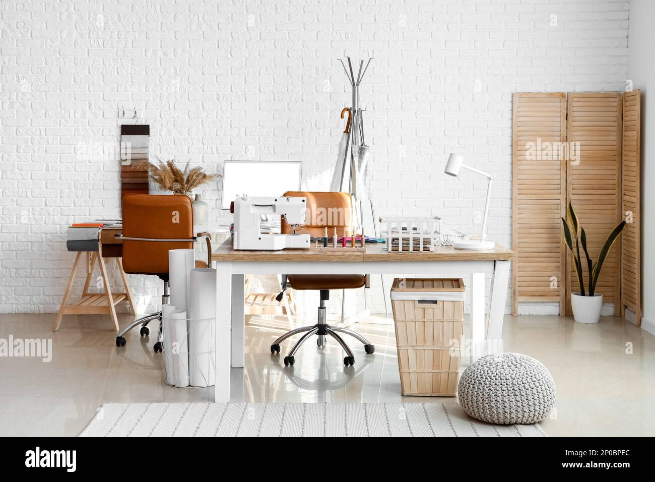 Interior clothing workshop with tables hi-res stock photography and ...