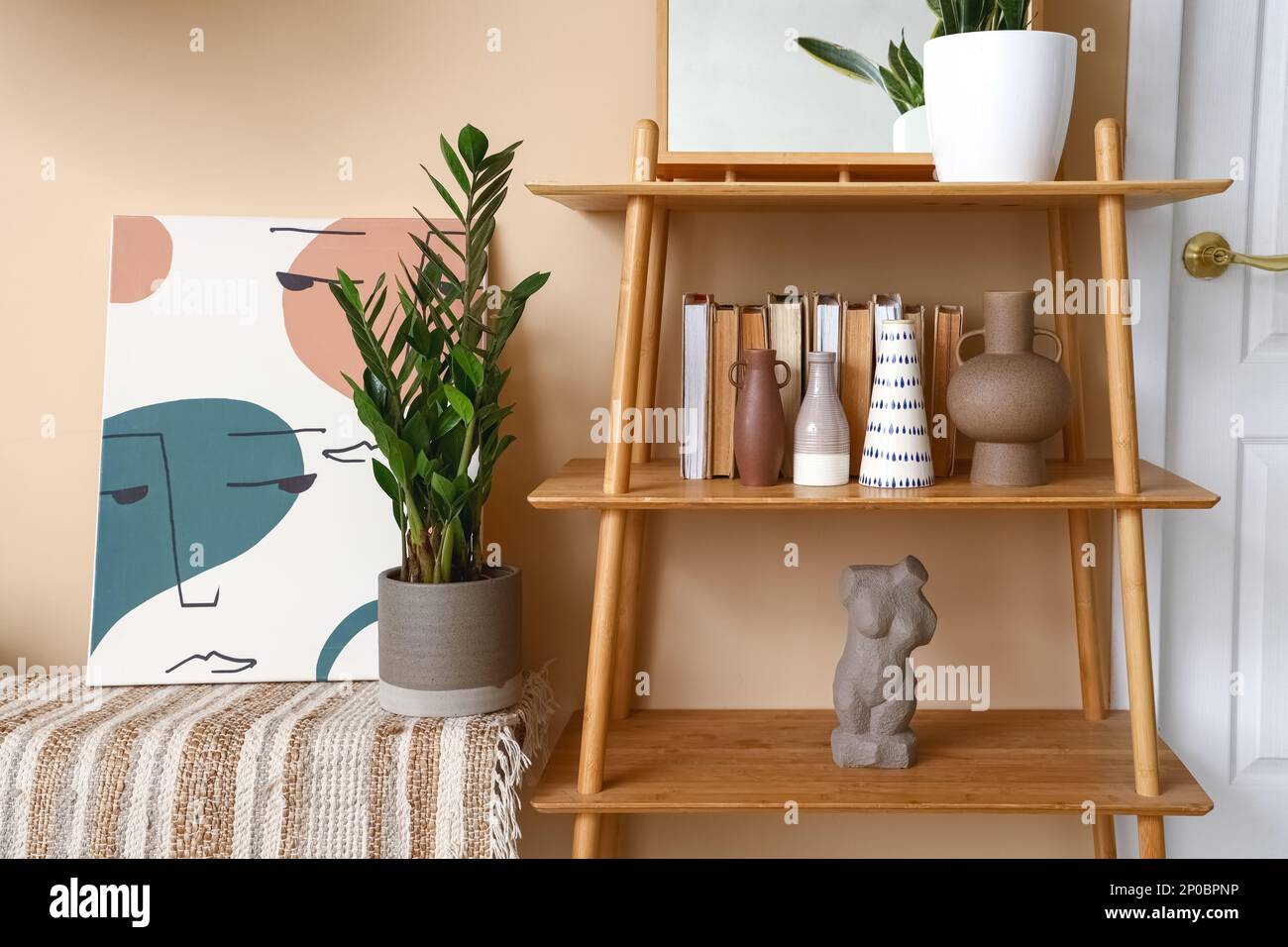 Interior of hall with shelving unit and bench Stock Photo - Alamy