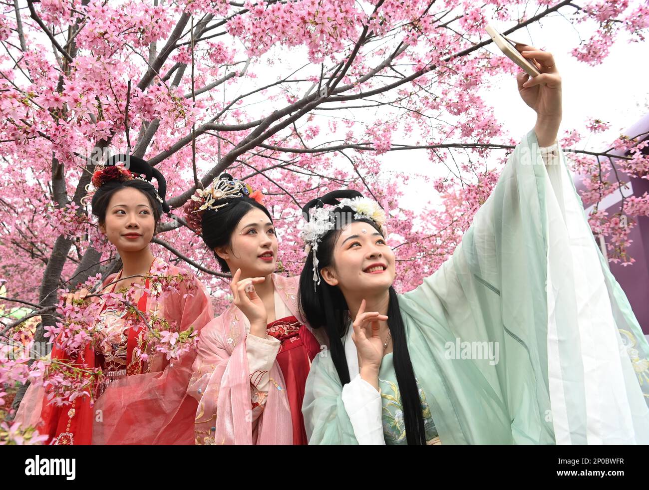 **CHINESE MAINLAND, HONG KONG, MACAU AND TAIWAN OUT** Young women ...