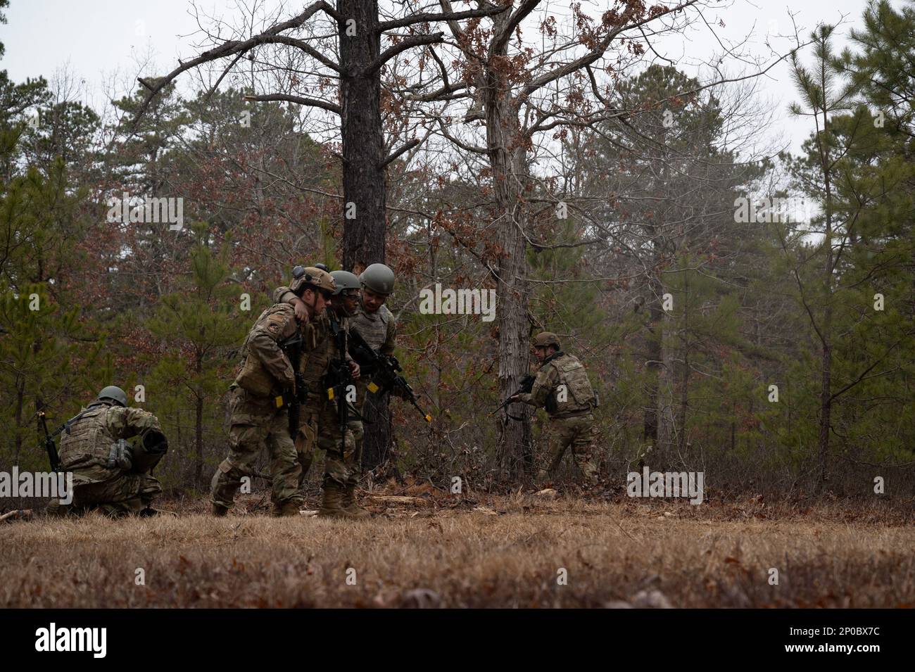 U.S. Air Force Airmen execute a buddy carry during a final assessment ...