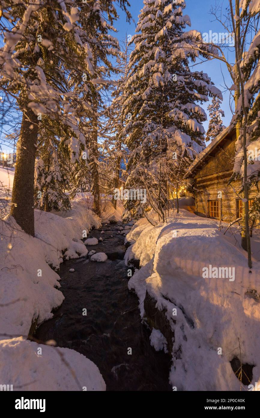 Winterscene at night with the creek in front of the Owl Bar at Sundance ...