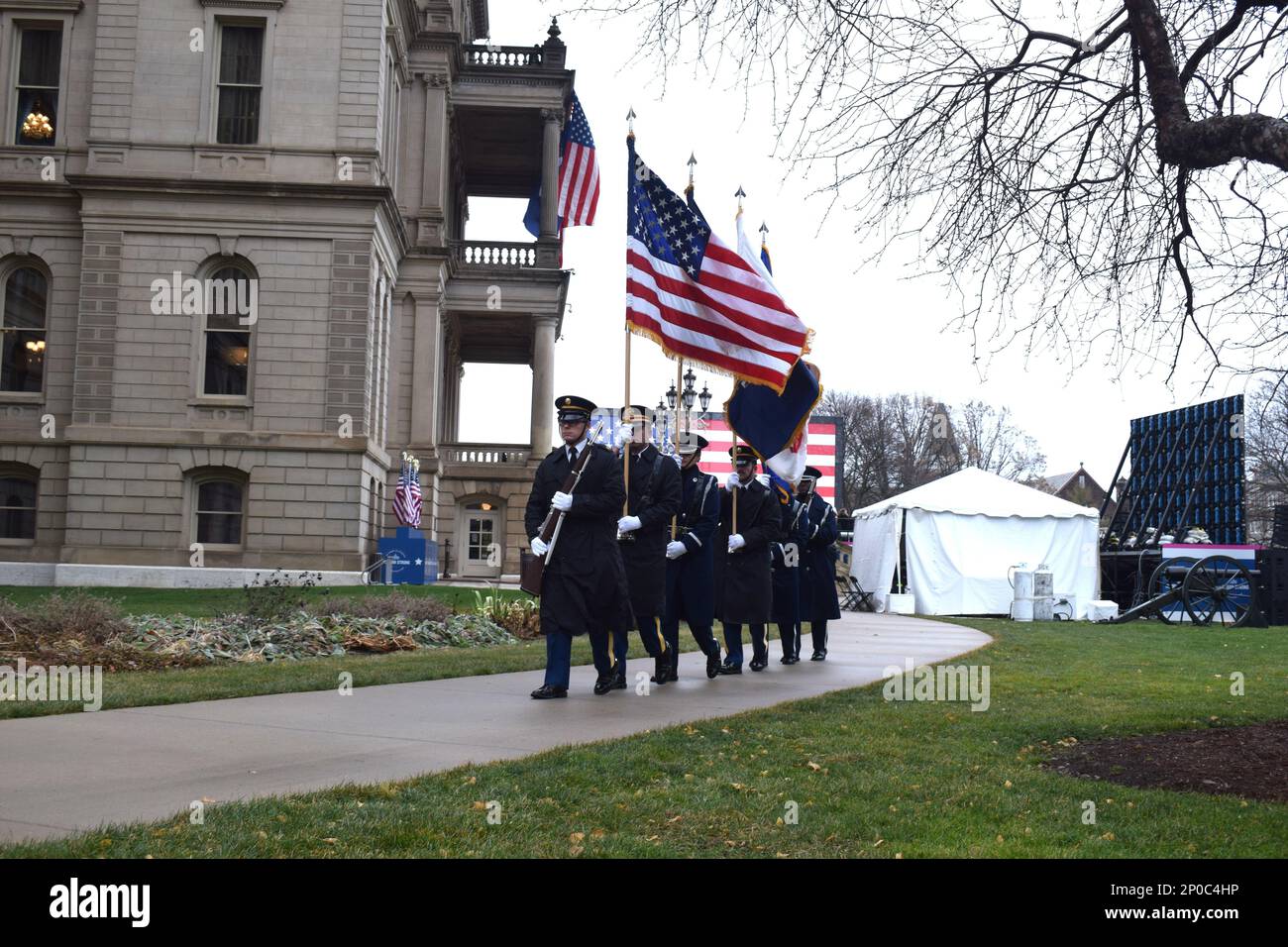 Members of the Michigan National Guard's Joint Color Guard retire the ...