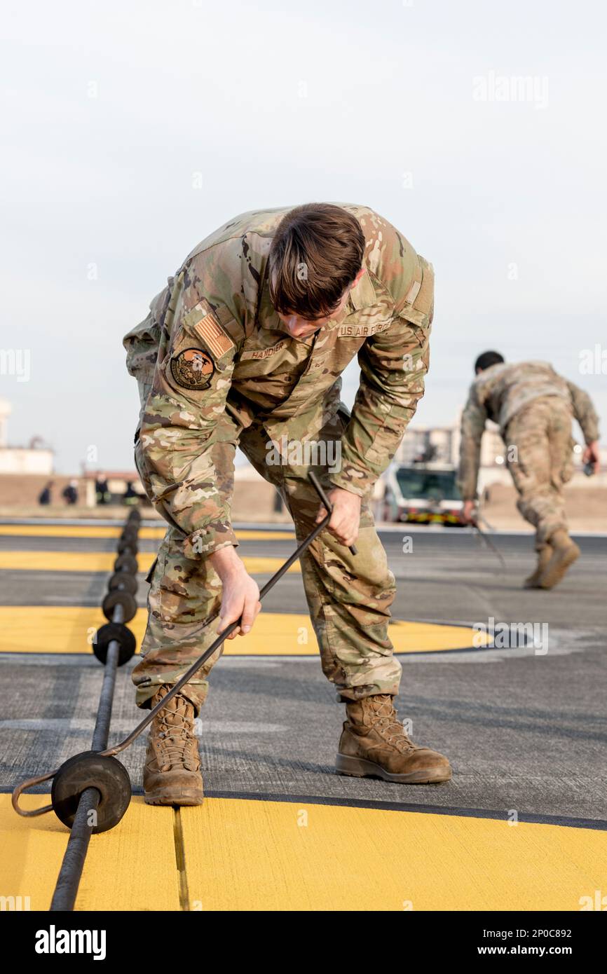 Senior Airman Jacob Handler, 374th Civil Engineer Squadron power ...