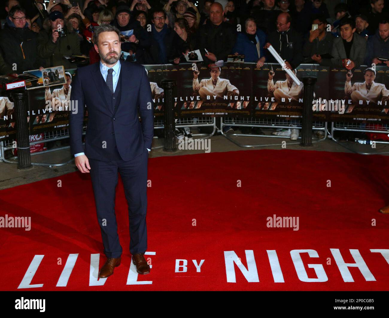 Actor Ben Affleck poses for photographers upon arrival at the premiere ...