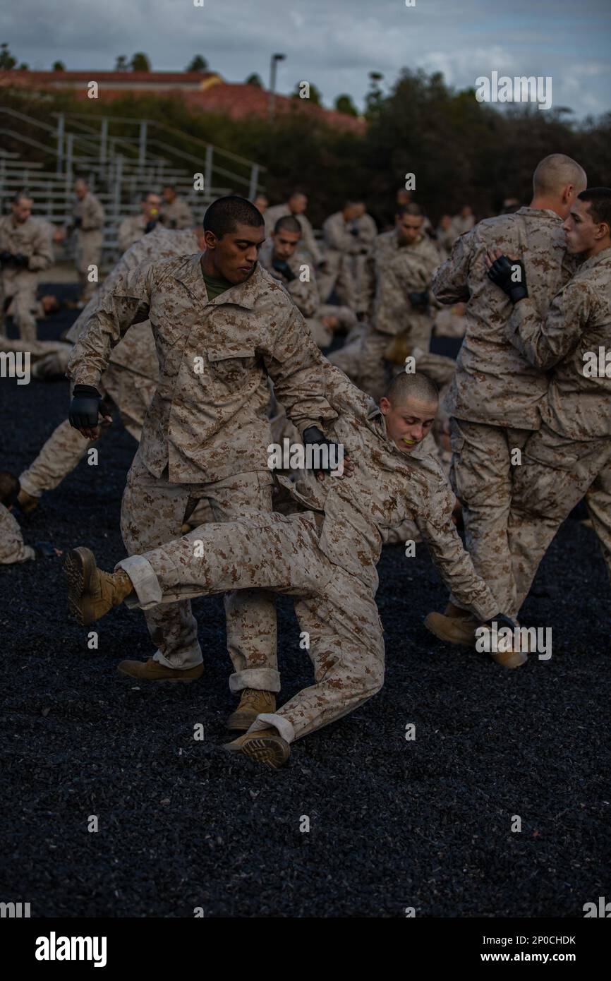 U.S. Marine Corps recruits with Kilo Company, 3rd Recruit Training Battalion, execute counter ...