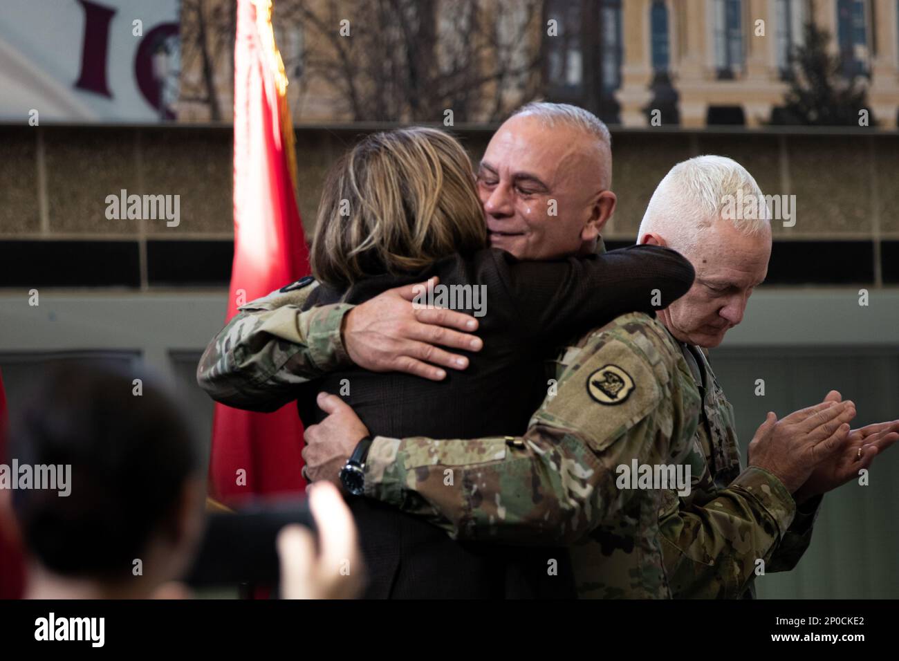 Maj. Gen. Benjamin Corell embraces Iowa Gov. Kim Reynolds during his ...