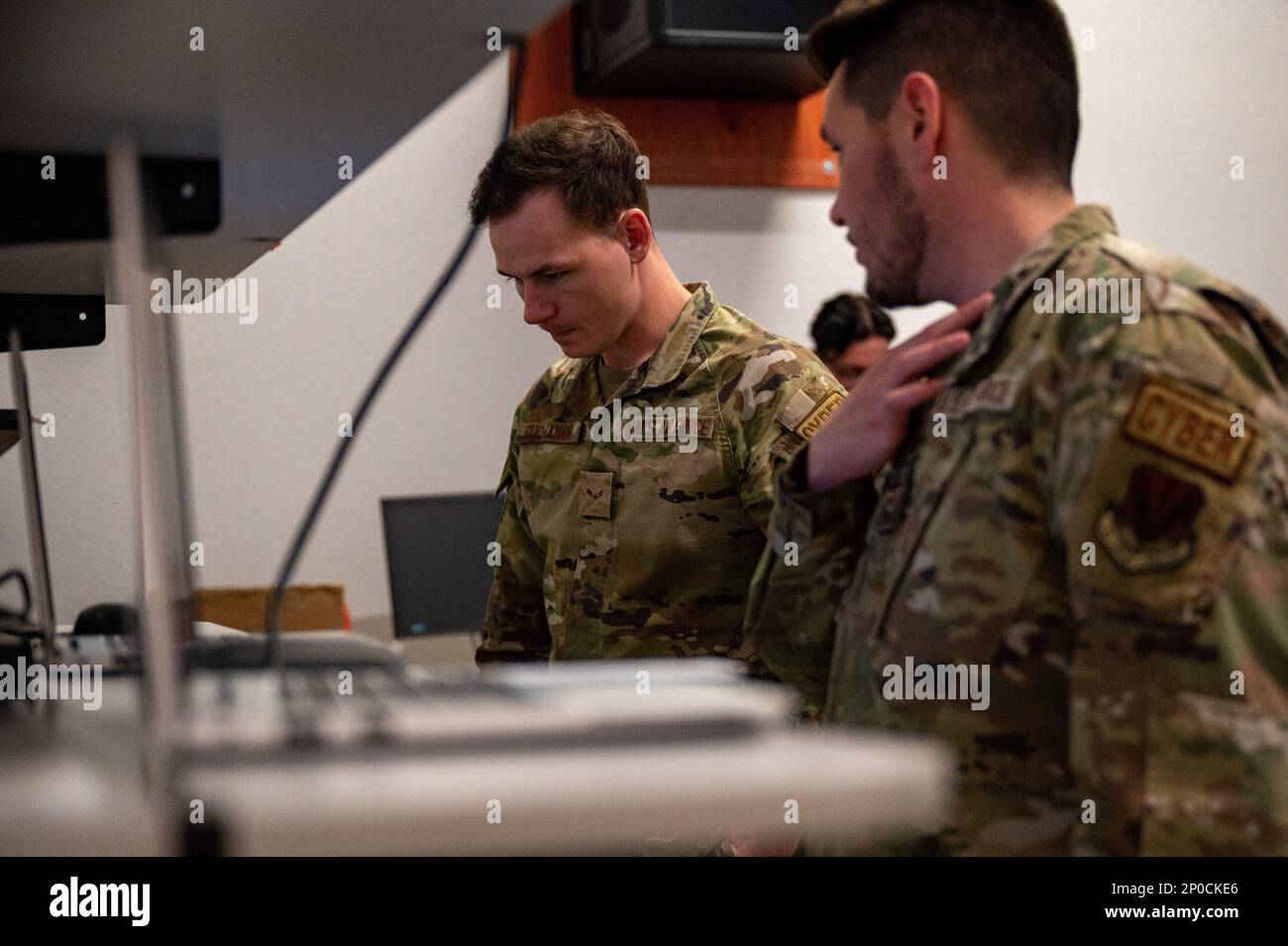 U.S. Air Force Airmen assigned to the 355th Communications Squadron image new computers at Davis ...