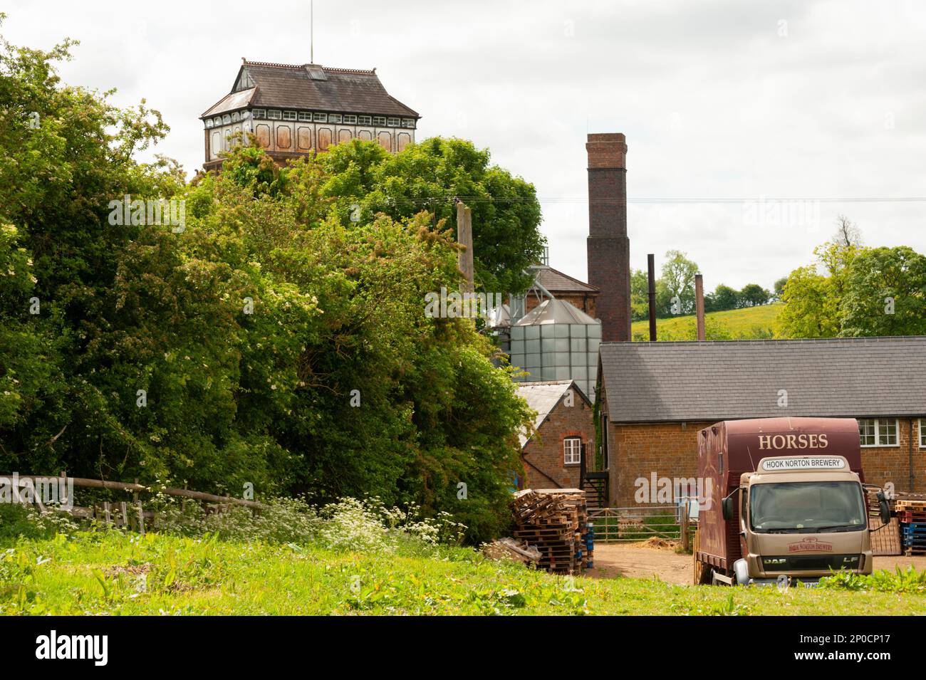 A traditional Victorian tower brewery, the Hook Norton Brewery still ...