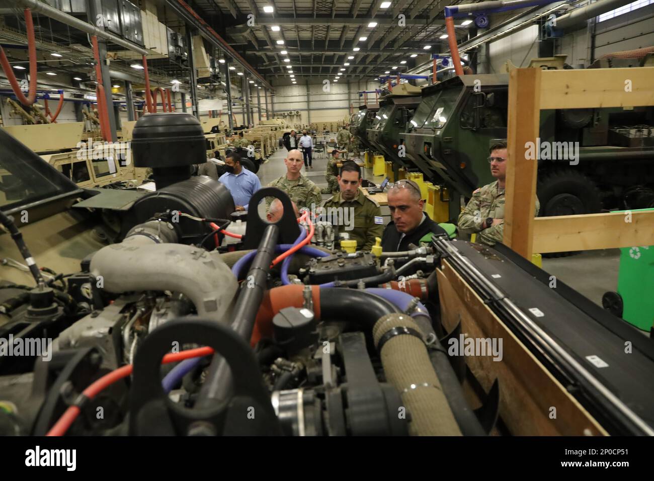 Brig. Gen. Ronen Cohen inspects the engine compartment of a Joint Light ...