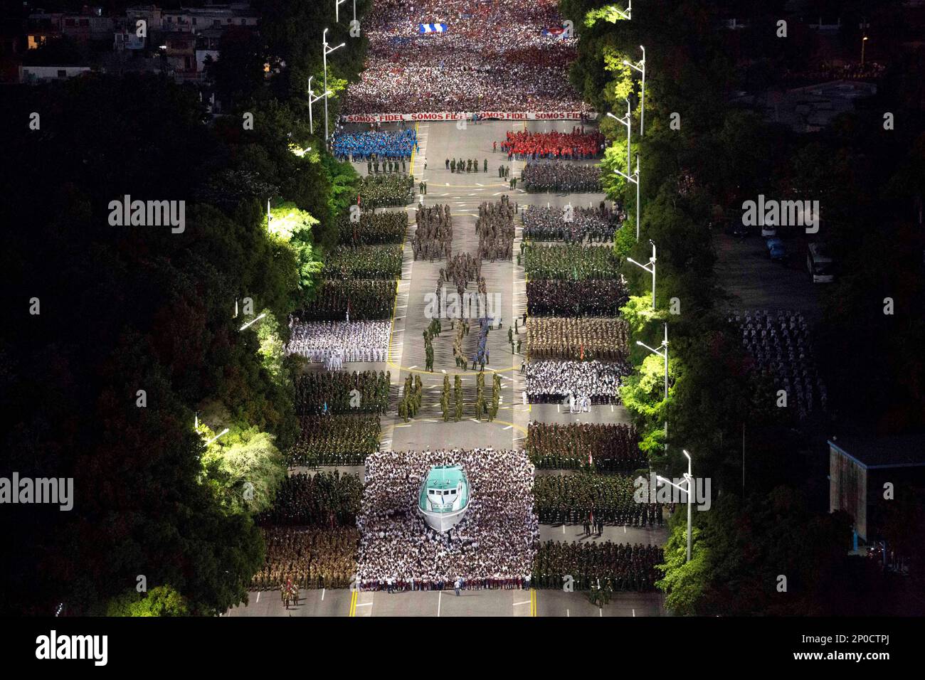 A replica of the Granma yacht is surrounded by soldiers before the ...