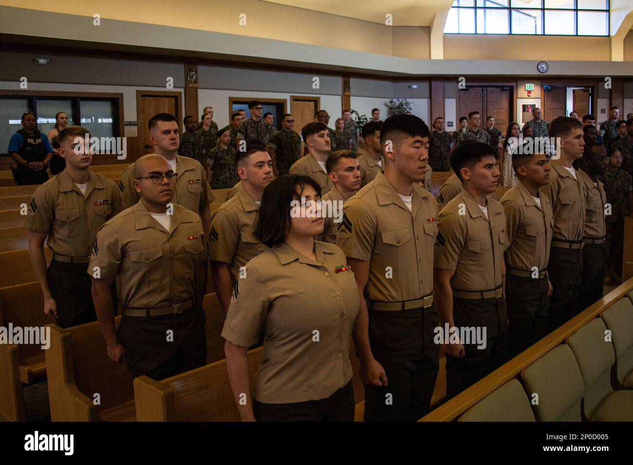 U.S. Marines stand for the playing of the national anthem during ...