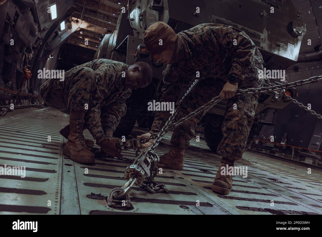 U.S. Marine Corps Cpl. Malique Cookson, left, and Staff Sgt. Jose ...