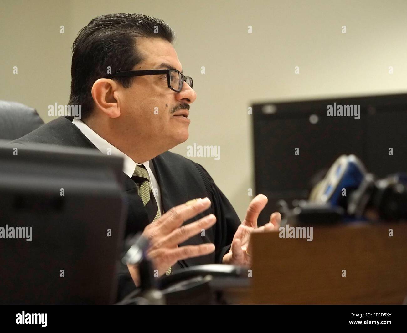 Superior Court Judge Dennis Nieves speaks as he sentences Michelle ...