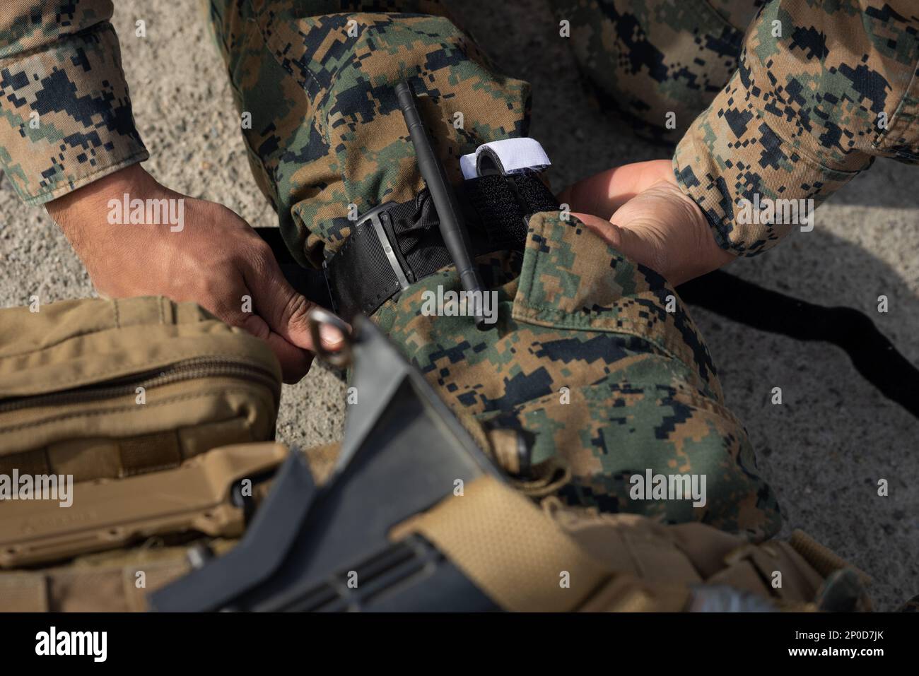 U.S. Marine Corps Cpl. Cesar Alarcon, a combat videographer with III ...