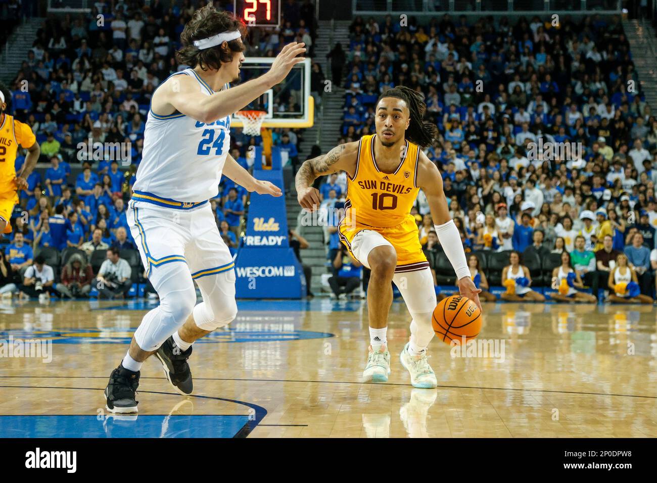 Arizona State guard Frankie Collins (10) drives against UCLA guard Jaime Jaquez Jr. (24) during ...