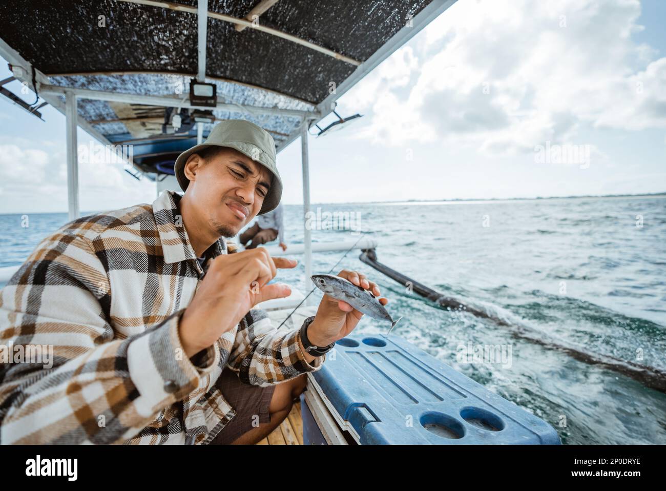 Sad man fishing rod hi-res stock photography and images - Alamy
