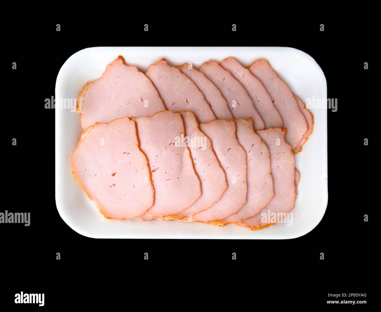 Top view of sliced smoked beef meat isolated on black background. Raw ...
