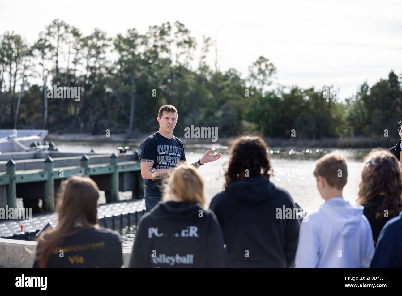 U.S. Navy Boatswain Mate (BM) 2nd Class Neylon Curley tells students ...