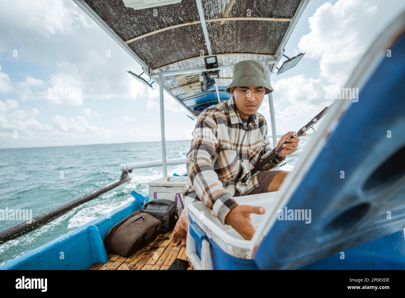 Sad man fishing rod hi-res stock photography and images - Alamy
