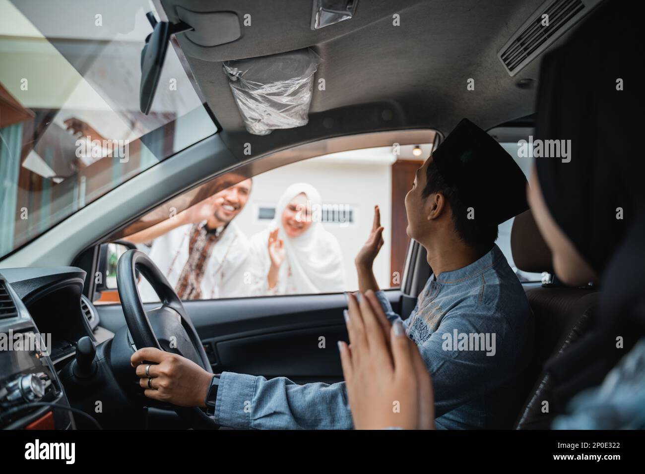 Waving goodbye to guests hi-res stock photography and images - Alamy