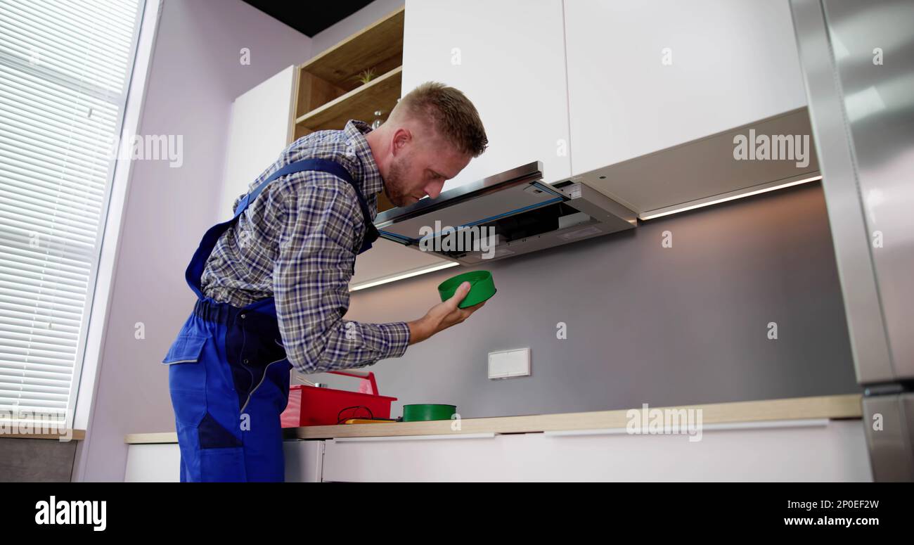 Stove Exhaust Fan Extractor Filter Maintenance And Change Stock Photo ...