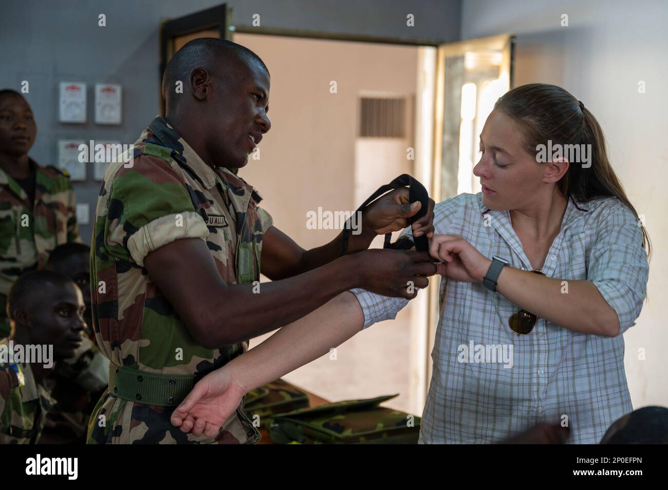 U.S. Army Sgt. Sara Corey, 443rd Civil Affairs Battalion, demonstrates ...