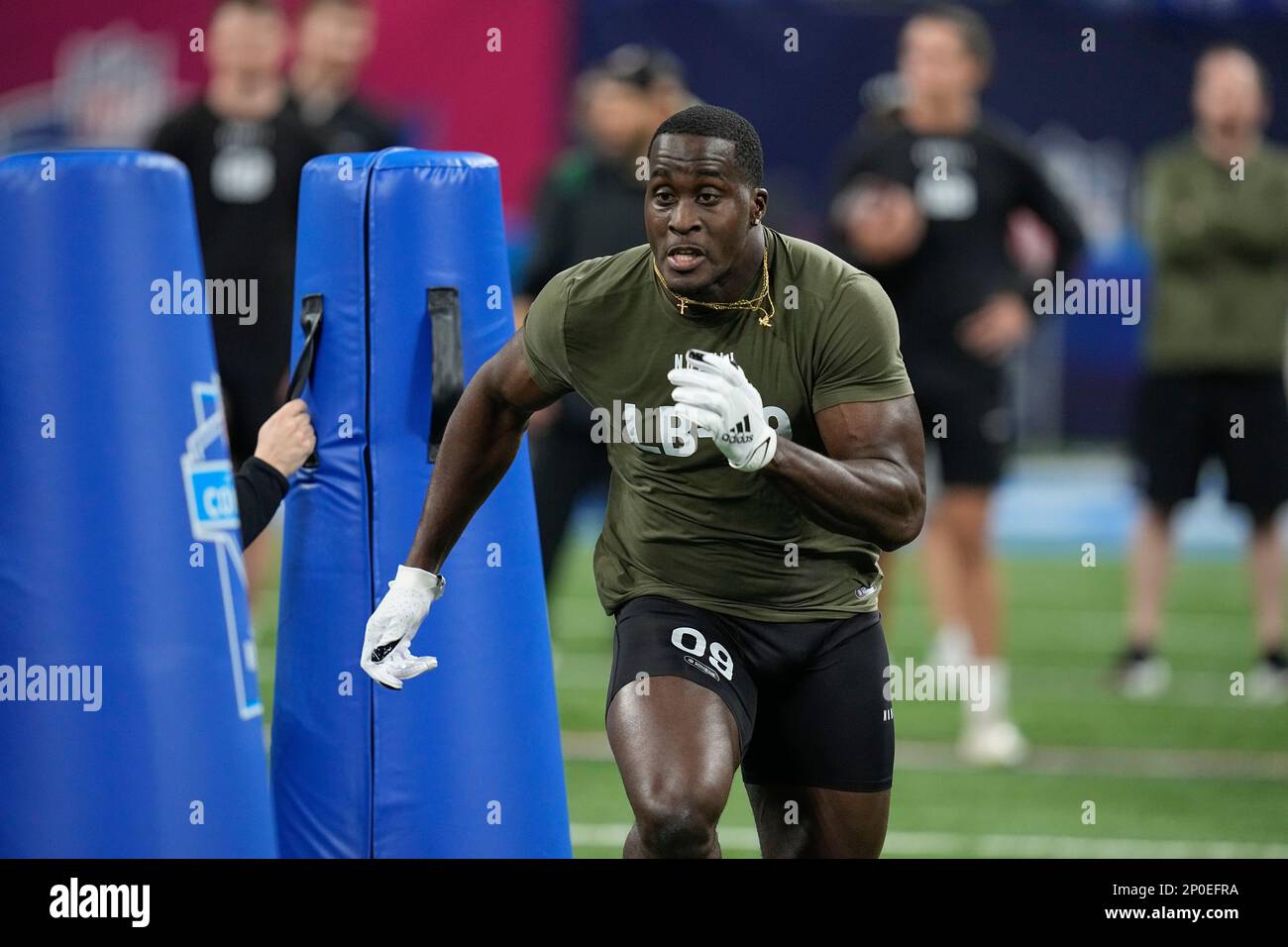 Auburn linebacker Derick Hall runs a drill at the NFL football scouting ...