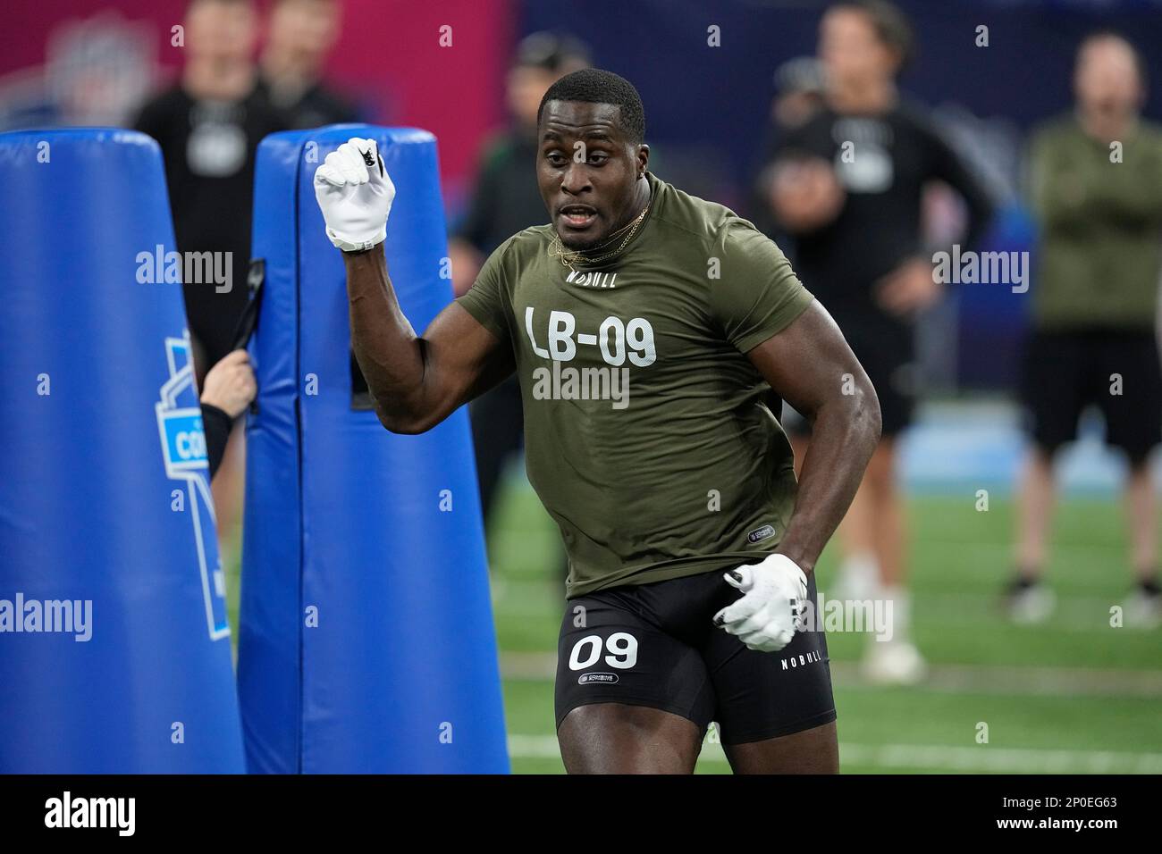 Auburn linebacker Derick Hall runs a drill at the NFL football scouting ...