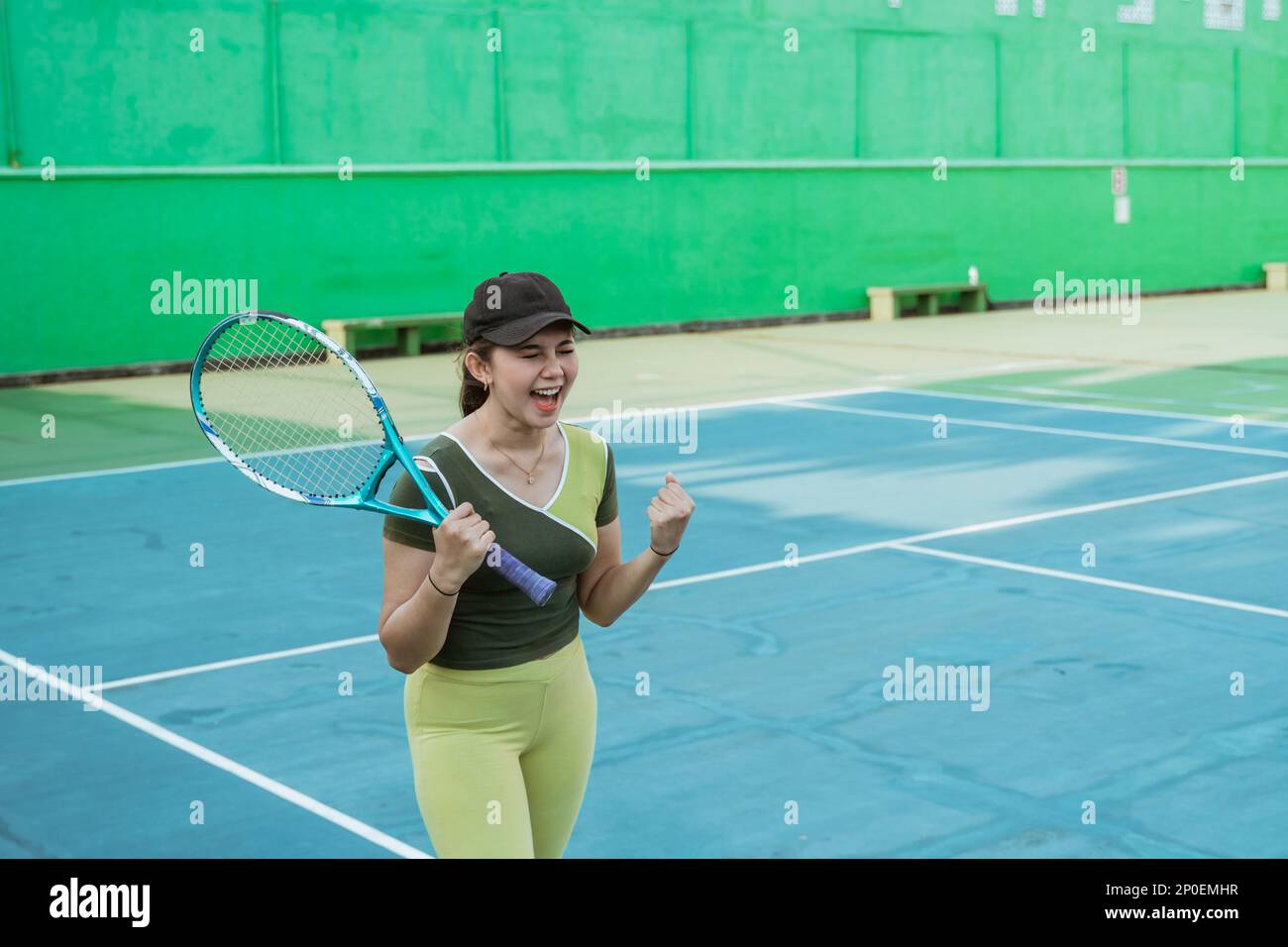 female tennis player screaming with fists clenched as she points Stock ...