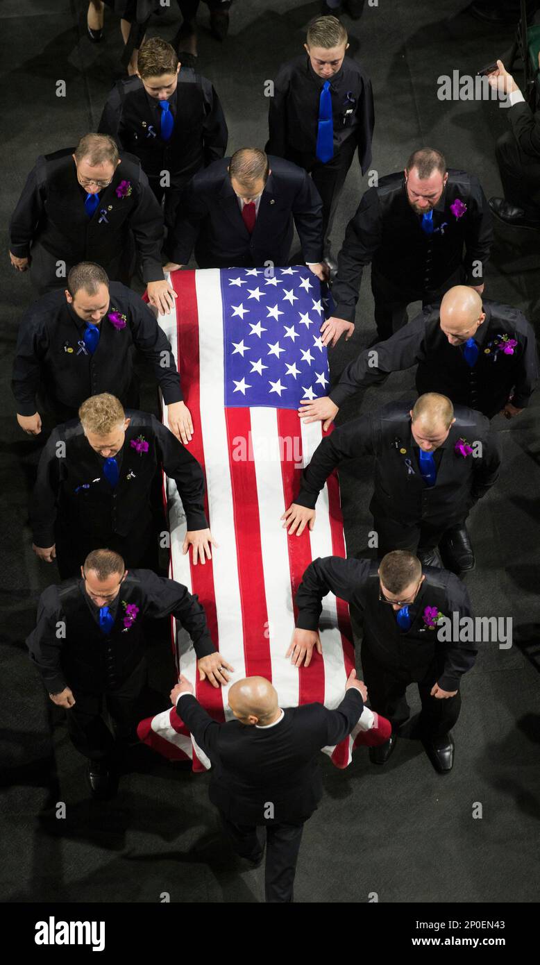 FILE - This Nov. 14, 2016, file photo, pallbearers walk with the casket ...