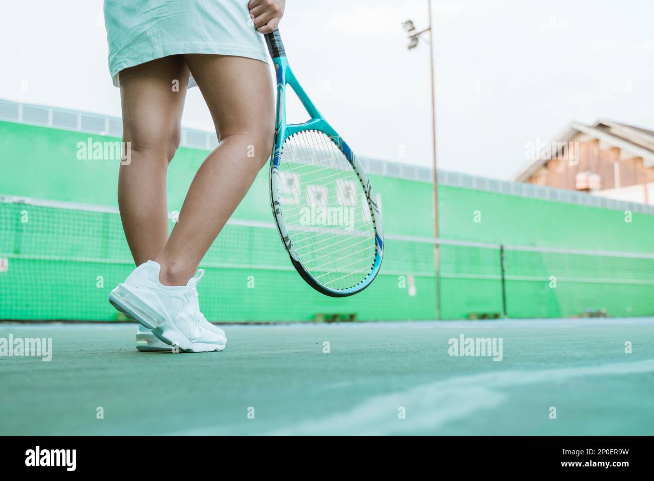 Young female tennis player wearing hi-res stock photography and images ...