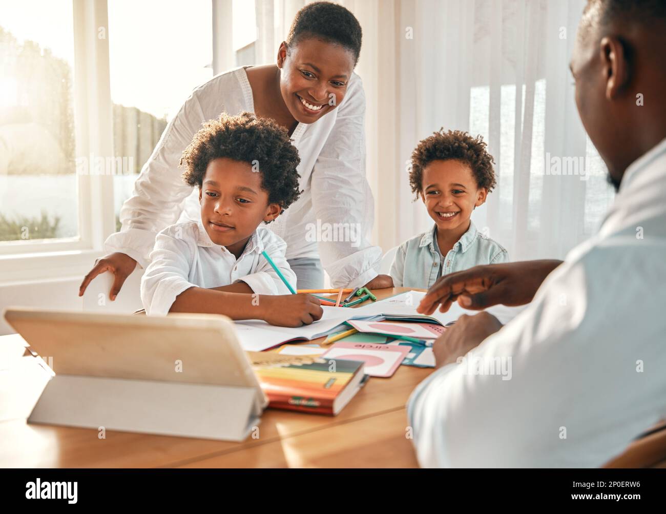Elearning, children video and education with mother and father help of ...