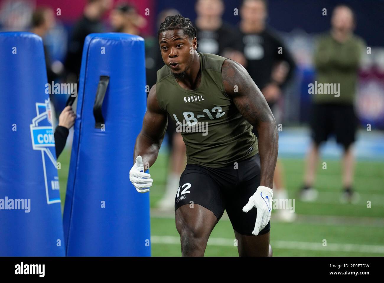 Duke linebacker Shaka Heyward runs a drill at the NFL football scouting ...