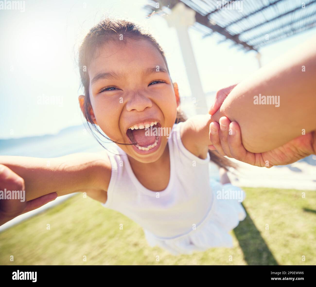 Girl child, pov spin and happy portrait with speed, smile and ocean ...