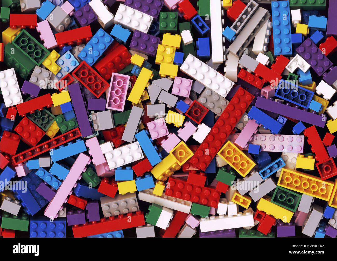 Lot of various colorful blocks background. Many assorted building ...